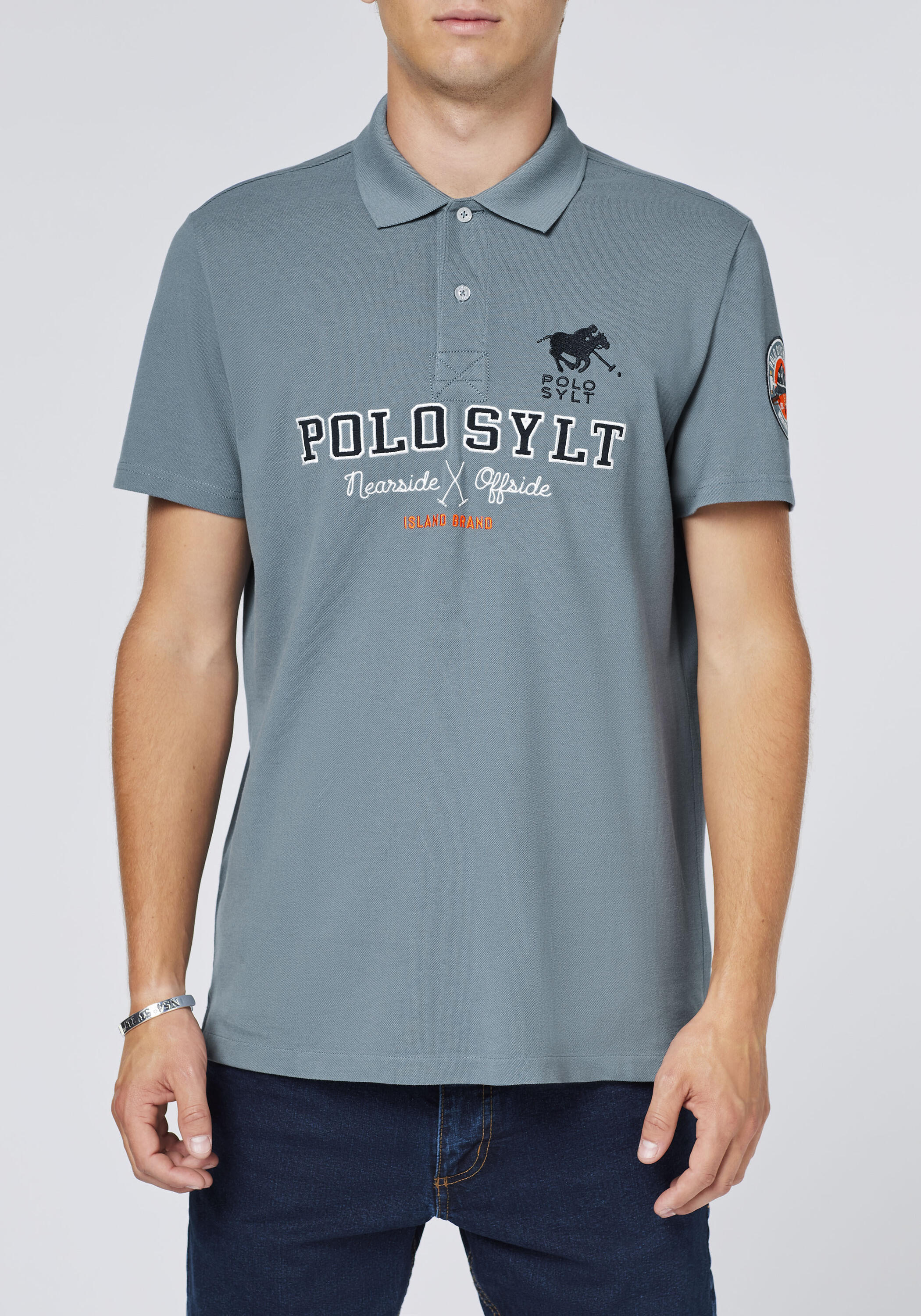 Polo mit Logo-Applikation und Stickerei | Decathlon