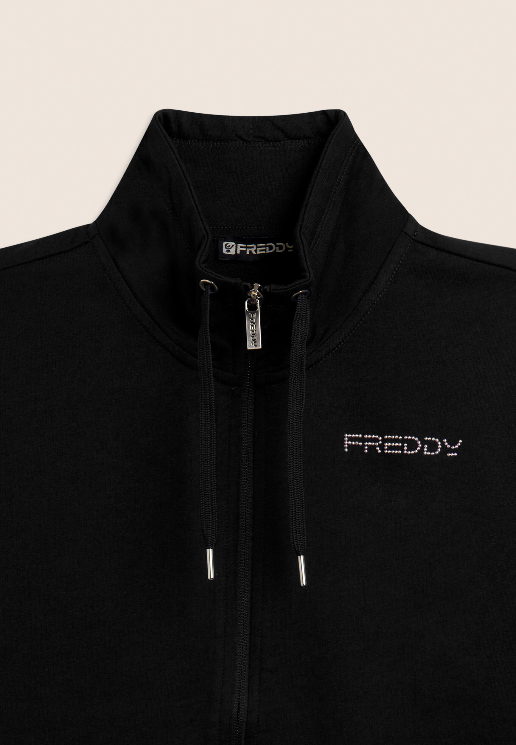 Sweat-shirt à col montant offre une coupe confortable avec fermeture ...