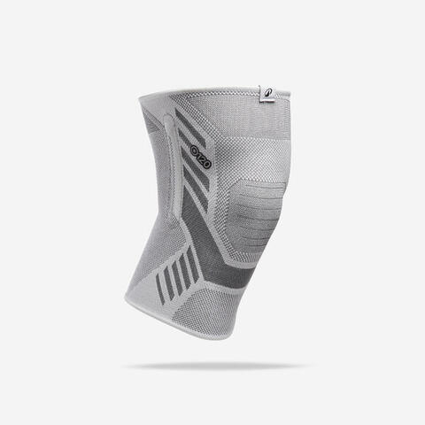 Right or left knee support with side reinforcements