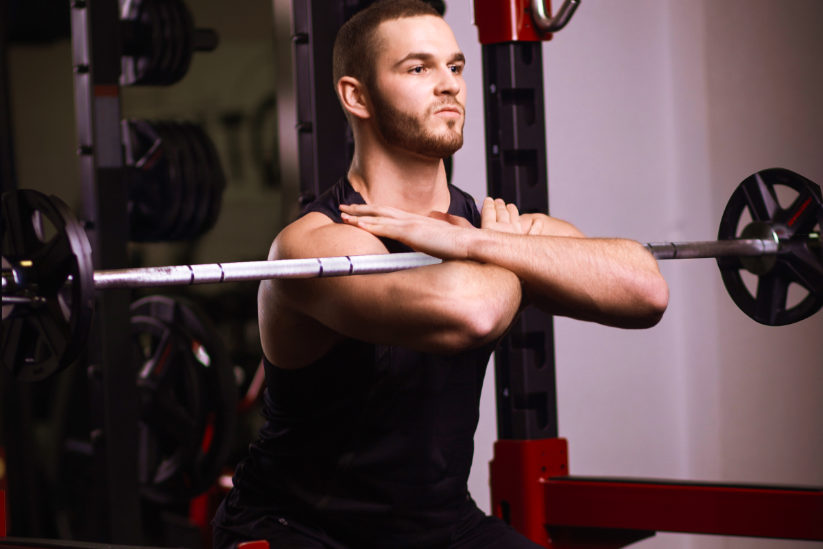 Zercher squat: jak wykonać przysiad Zerchera ze sztangą?